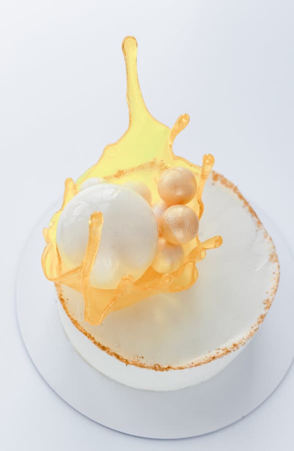 Exotic Cake with White Chocolate Spheres and Caramel Splash Decorated ...