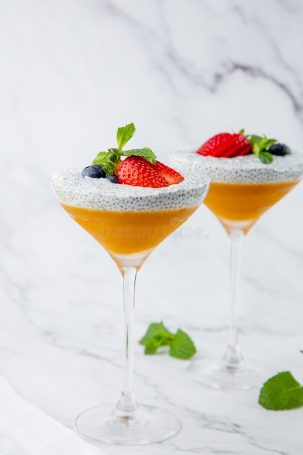 Exotic Fruit Cocktails with Berries and Chia Seed Topping and Mint Side ...