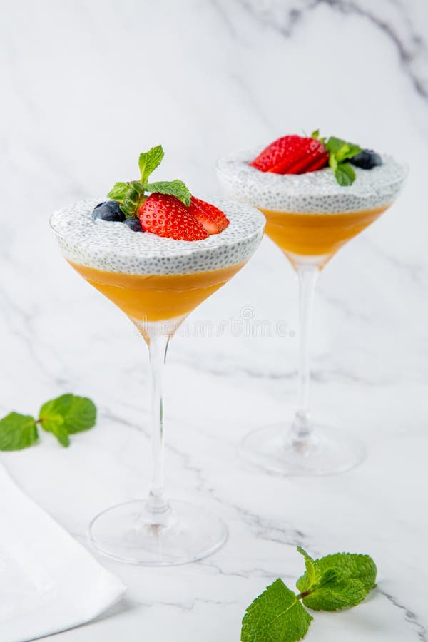 Exotic Fruit Cocktails with Berries and Chia Seed Topping and Mint Side ...
