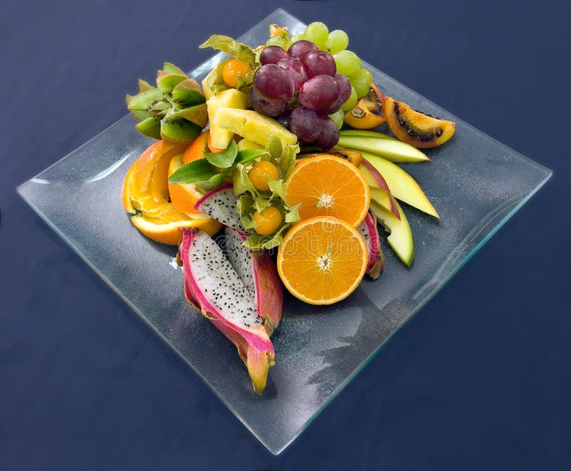 Exotic fruits on a plate stock photo. Image of lunch - 24953496