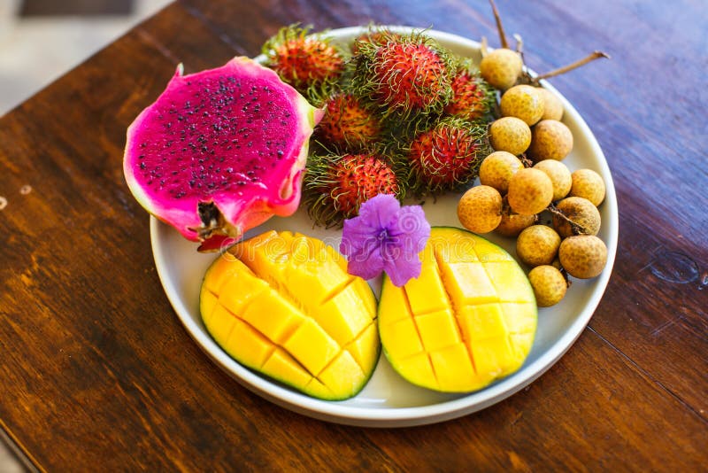 Exotic Fruits on Plate: Mango, Dragon Fruit; Mango; Pineapple an Stock ...