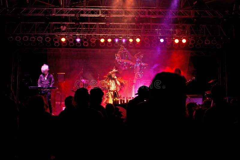 Exotic Man Singing on Pink Light Stage Faerieworld Editorial ...