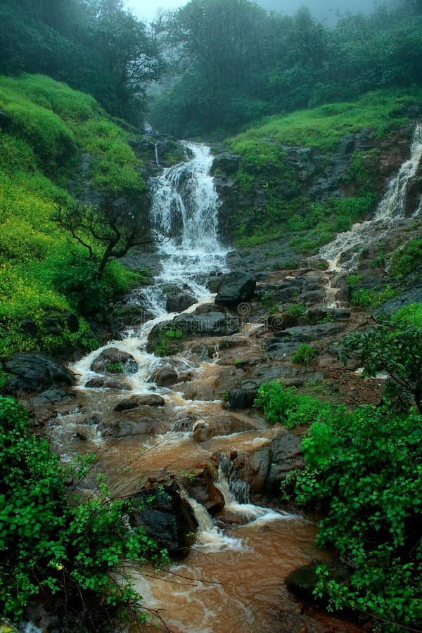 Exotic monsoon waterfall stock image. Image of muddy, resource - 7710521