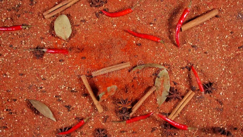 Exotic Spices and Chilli Pepper Flying Up and Falling Down in Slow ...