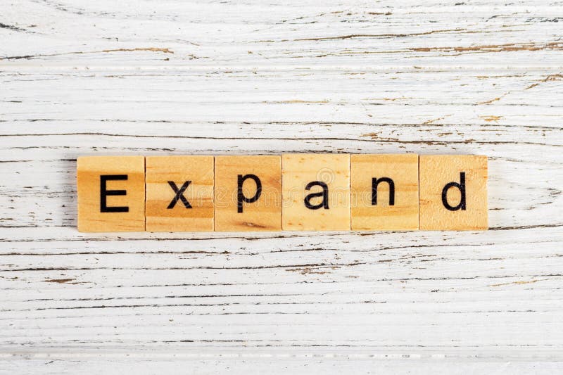 EXPAND Word Made with Wooden Blocks Concept Stock Image - Image of ...