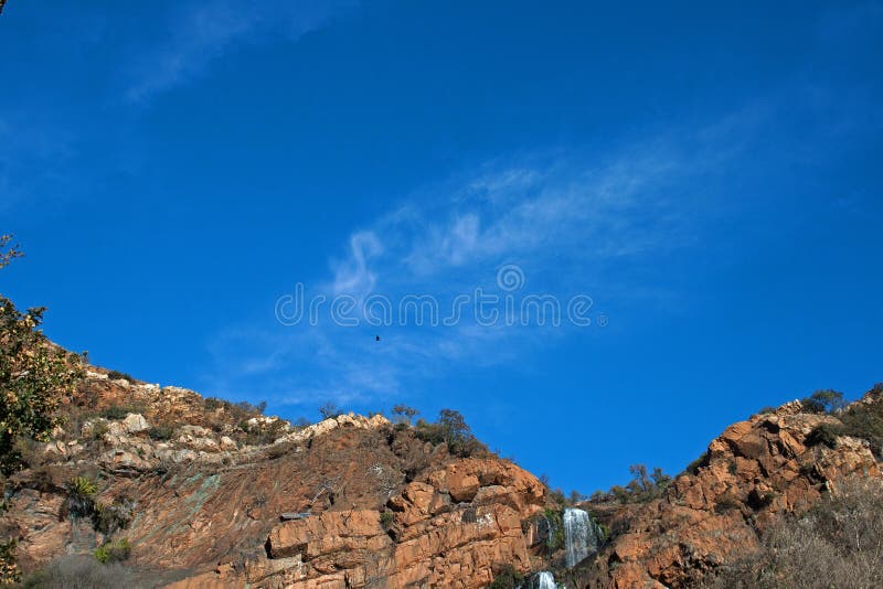 TOP of CLIFF with START of WATERFALL Stock Photo - Image of bushes ...