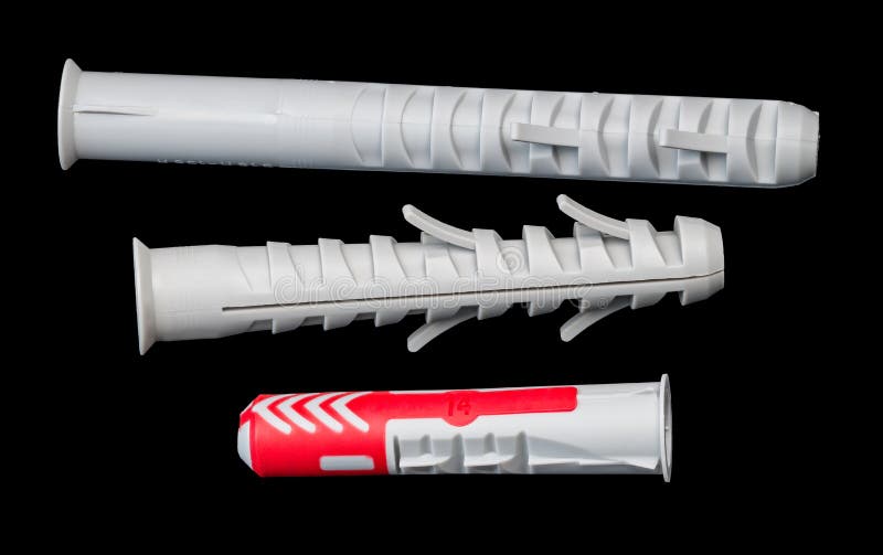 Set of Different Plastic Wall Plugs Isolated on a Black Background ...