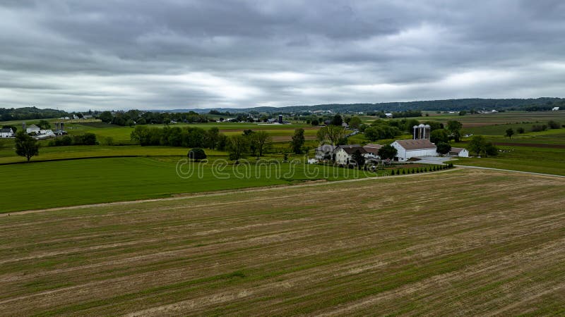 Expansive Aerial View of Farmstead and Patchwork Fields Stock Photo ...