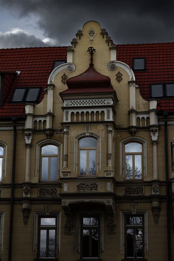 A Very Large Building with Some Windows and a Clock on it Stock Image ...