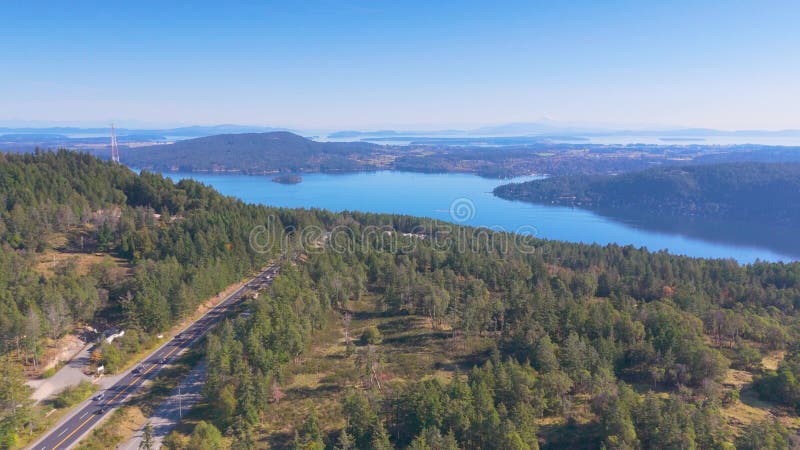 Breathtaking Aerial View of Lush Green Forest and Serene Blue Lake ...