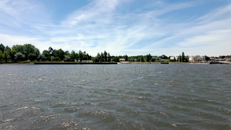 Expansive Lake View with Rippling Waters Under Wispy Clouds Stock ...