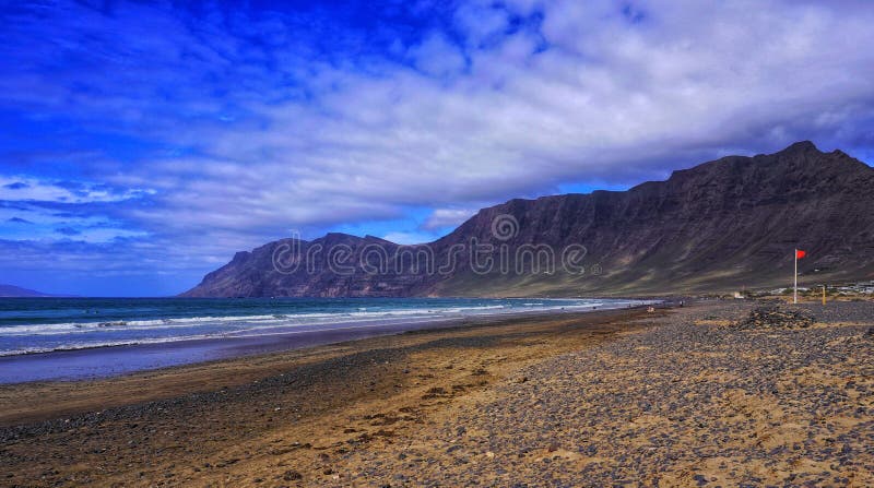 Famara Beach and Cliffs Under Dramatic Sky, Lanzarote, Canary Islands ...