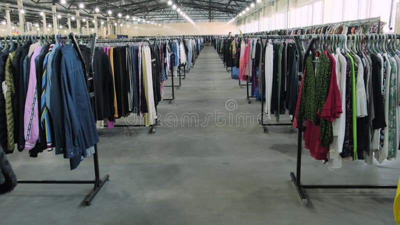 Large Second-hand Clothing Store Interior with Numerous Racks of ...
