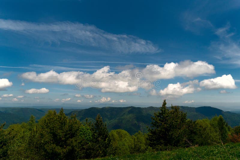 Expansive View Mountain Range with Fluffy Clouds Stock Image - Image of ...
