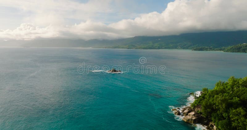 Expansive View of Ocean and Distant Mountains. Seychelles, Mahe. Stock ...