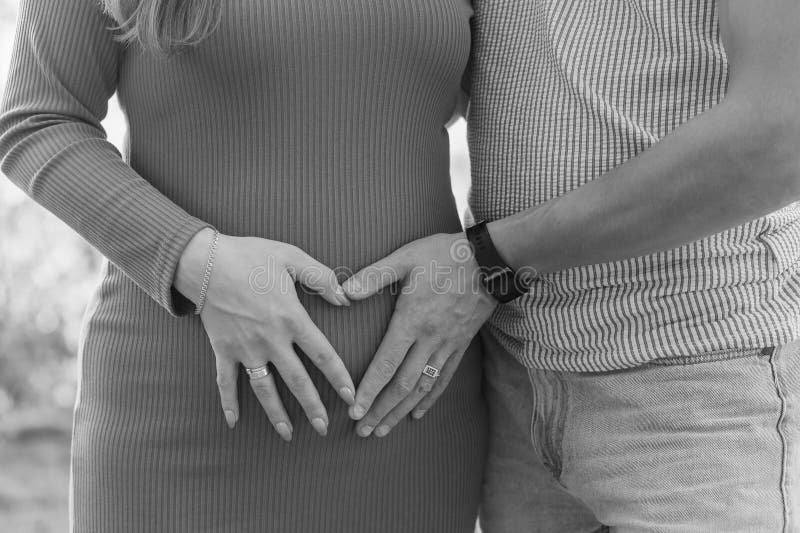 Expectant Parents Celebrating Pregnancy in a Tender Moment Stock Photo ...