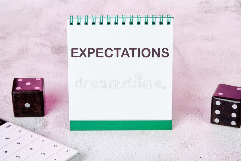 EXPECTATIONS Text on a White Notepad Sheet Next To Dice on an Abstract ...