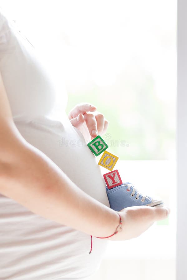 Expecting baby boy stock image. Image of finger, breast - 59006901