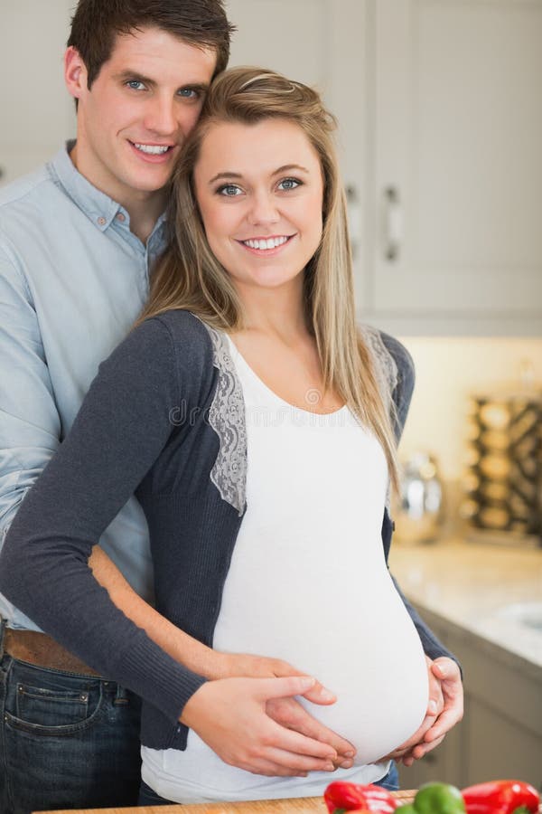 Expecting couple stock image. Image of affection, happy - 30881379