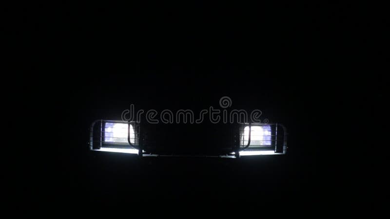Expeditionary SUV Switch on Bright Headlight and Additional ...