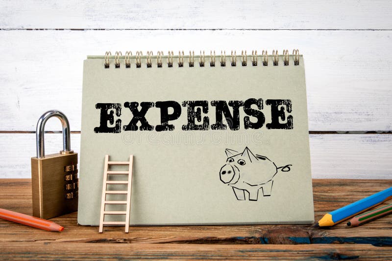 EXPENSE. Green Notepad on Wooden Texture Table and White Background ...