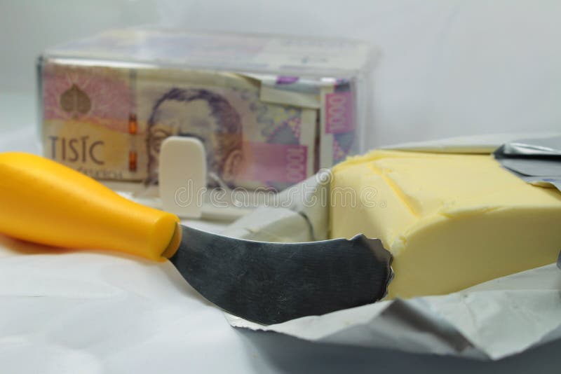 The Expensive Butter and Yellow Knife and Czech Crowns Stock Photo ...