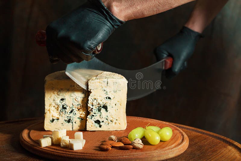 Expensive Elite Cheese on a Wooden Background Stock Image - Image of ...