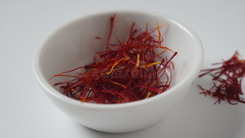 Expensive Red Dried Saffron Spice in a Bowl Stock Photo - Image of ...