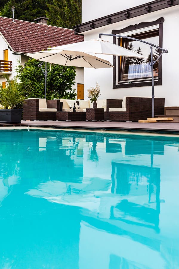 Parasol at the poolside stock image. Image of lounge - 32334775