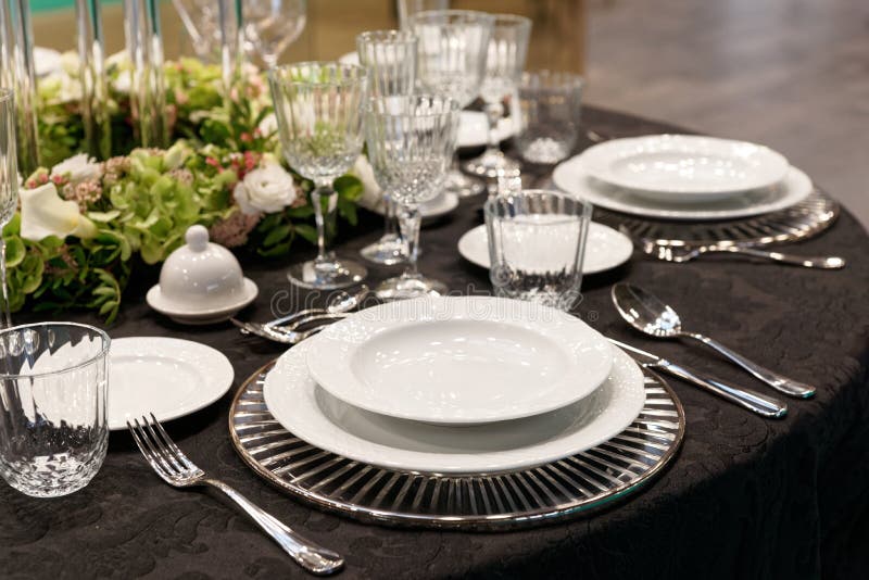 Expensive Stylish Set of Porcelain, Cutlery and Glassware Stock Photo ...