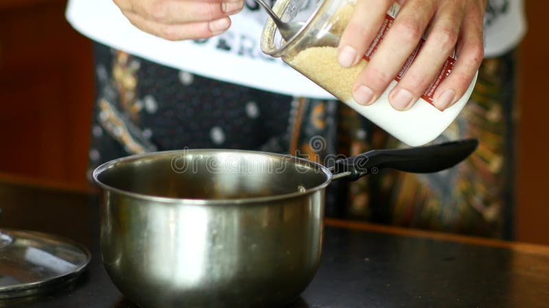 Pouring Sugar into Pot with Spoon Stock Video - Video of carbohydrate ...