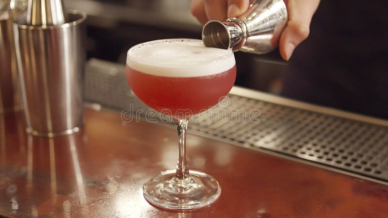 Experience the Art of Mixology a Bartender Skillfully Shaking a Vibrant ...