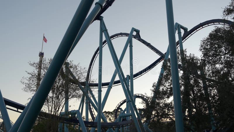 Enjoy Thrilling Roller Coaster Rides at Adventure Park in the Evening ...