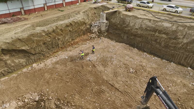 Groundbreaking Work: Aerial 4K of Machinery and Workers Stock Footage ...