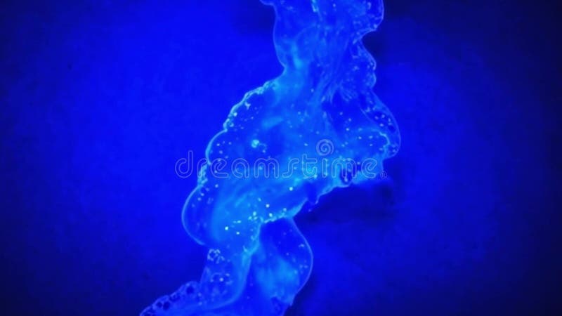 Fluid Dynamics in Motion Blue Liquid and Particle Flow Stock Video ...