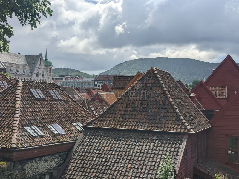 Experience Old Rooftops Historical Charm with a Mountain View Under a ...
