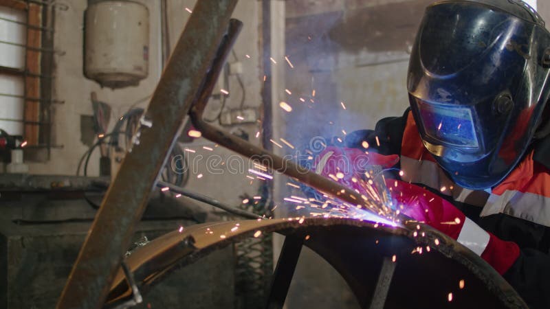 Experience the Power of Technology and Craftsmanship As a Welder Works ...