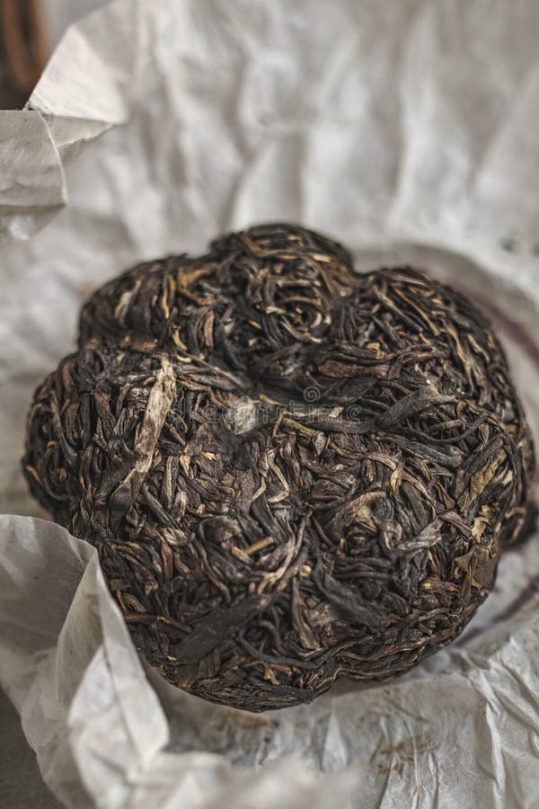 Experience the Richness of Compressed Puerh Tea Presented in Its ...
