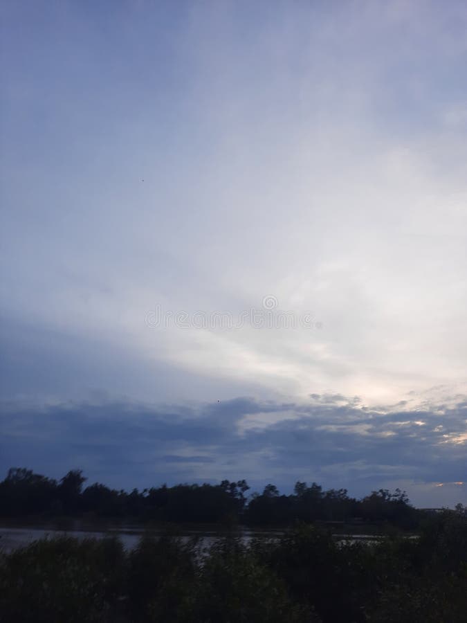 Experience the Serene Magic of Siak’s Golden Evening Skies. Stock Image ...