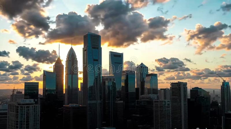 4K Hyperlapse of Clouds Over Modern City Skyline during Golden Hour ...