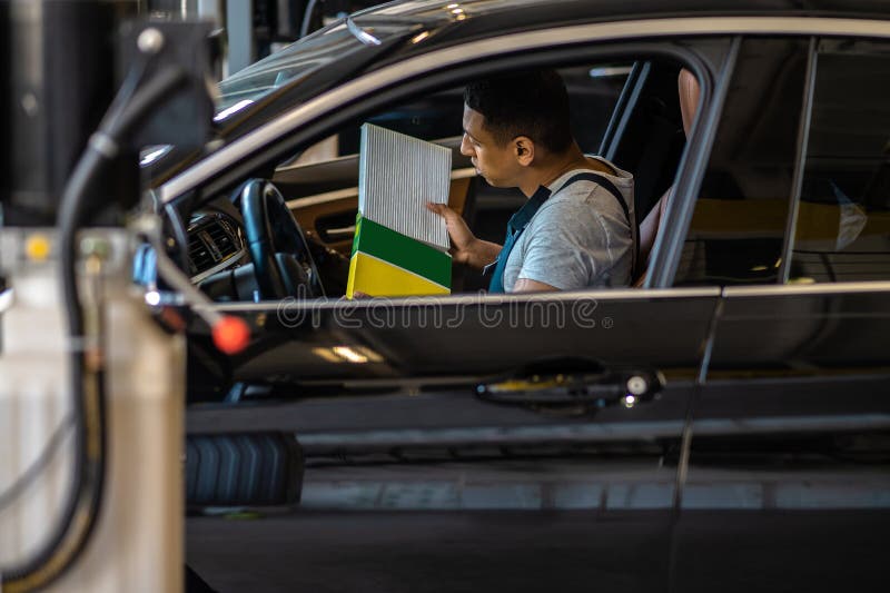Experienced African American Fixing the Customer Auto Stock Photo ...