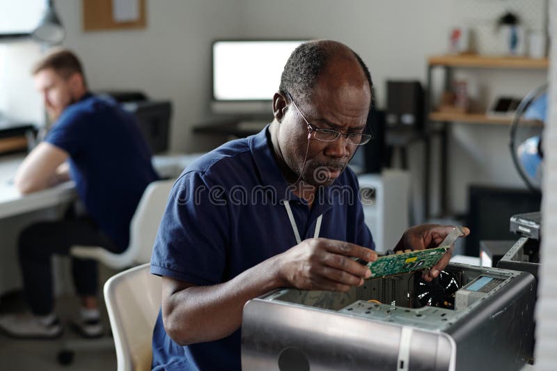 Experienced African American Repairman Stock Photo - Image of small ...