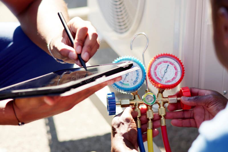 Experienced Air Conditioning Technician Repairing Heat Pump Stock Photo ...