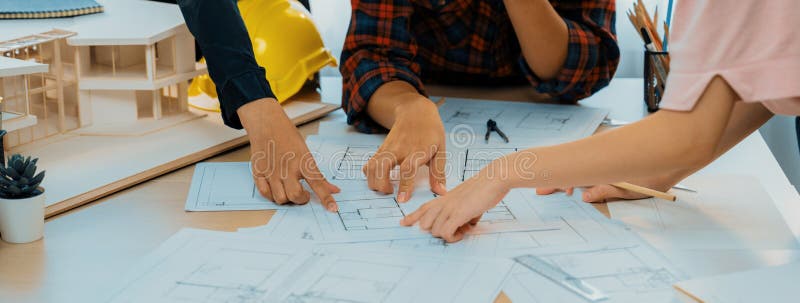 Architect Engineer Team Working Together and Designing House Plan ...