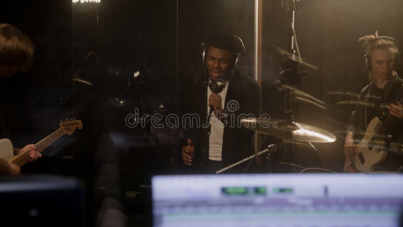 Experienced Audio Engineer Looks at Musicians Work Stock Image - Image ...