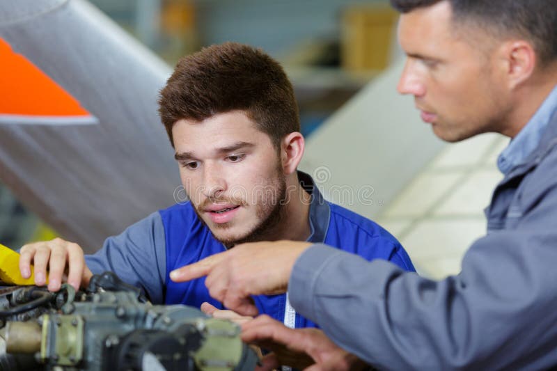 Experienced Auto Mechanic Scanning and Interpreting Engine Stock Photo ...