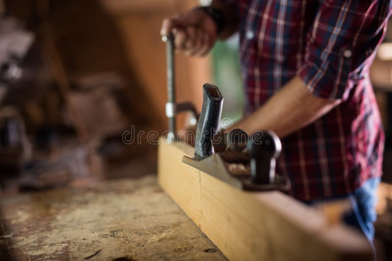 Experienced Carpenter in Work Clothes and Small Business Owner Working ...