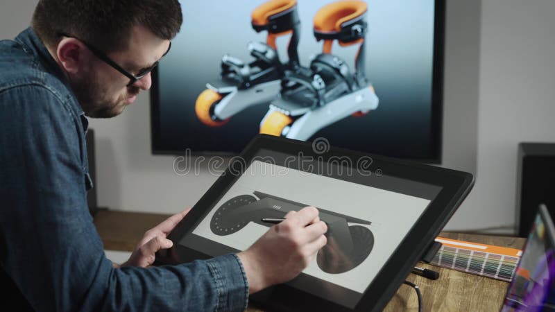 Experienced Chief Engineer in an Industrial Design Studio. a Man is ...