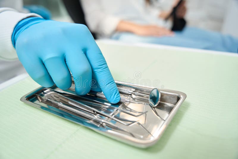 Experienced Dentist Selecting Tool for Patient Examination Stock Image ... Experienced Dentist Selecting Tool for Patient Examination Stock Image ...