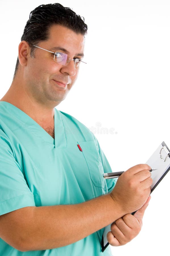Doctor writing on notepad stock image. Image of surgeon - 6905285